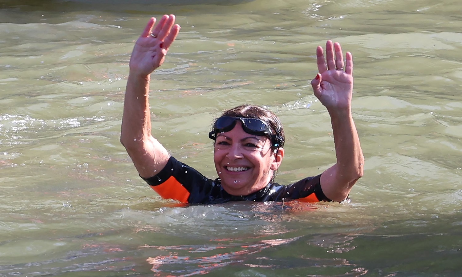 Paris mayor swims in River Seine as it is cleaned up ahead of Olympics